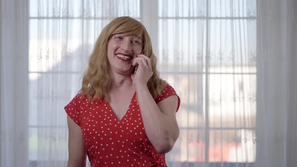 Medium Shot Joyful Trans Woman Talking on Phone Laughing Standing ...