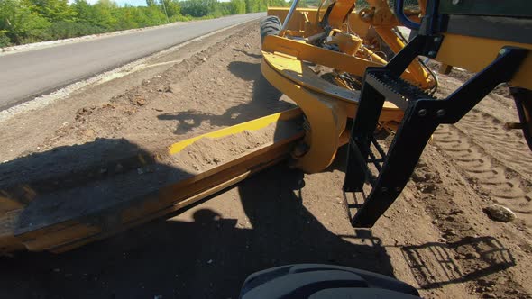 Grader Levels Ground for Construction of New Road or Highway Blade Rake ...
