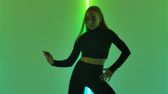 Professional Dancer Spins and Jumps Dancing Elements Contempt in a Dark ...