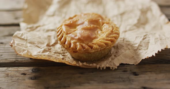 Video of pie seen from above on wooden background, Stock Footage ...