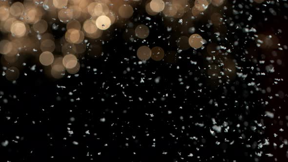 Super Slow Motion Shot of Real Snow Falling on Christmas Background at ...
