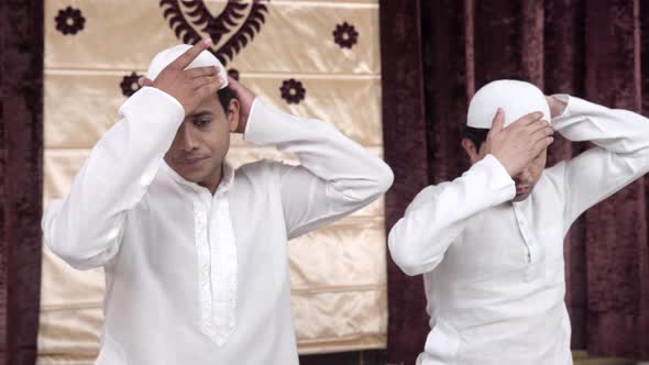 Muslim men adjusting cap, Stock Footage | VideoHive