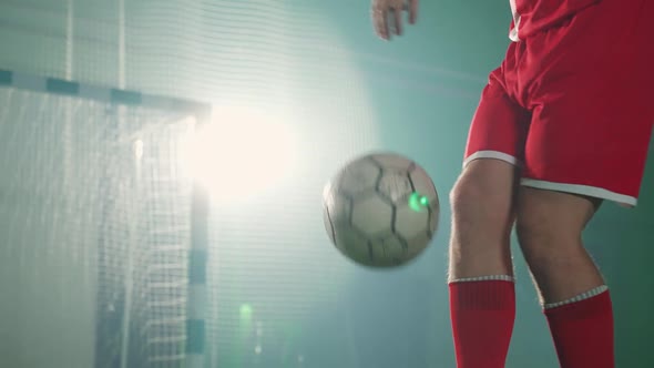 Slow Motion Young Football Player Performs Tricks with a Soccer Ball ...