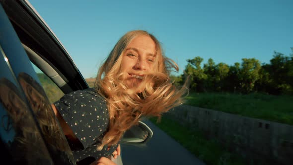 Happy Young Woman Hang Out of Car Window and Laugh, Stock Footage ...