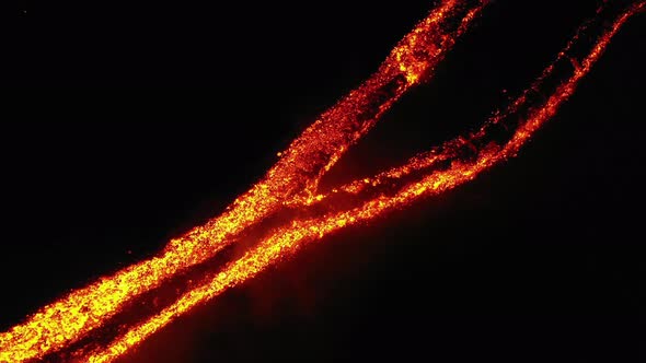Cinematic nighttime lava or magma drone shot, active volcano Mount Etna ...