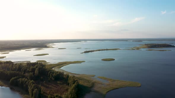 Aerial Flying Over Fresh Lakes With Blue Water At Sunset, Stock Footage