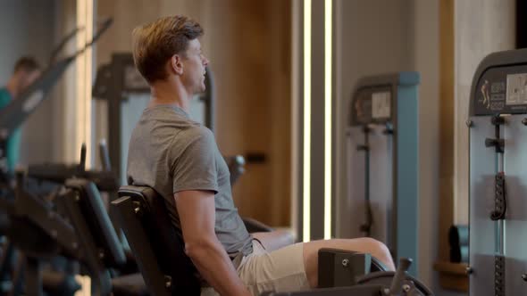 Strict Fitness Man Training at Gym. Sportsman Making Leg Press in Sport ...