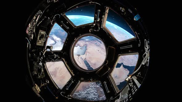 View From A Porthole Of Space Station On The Earth Background, Motion ...