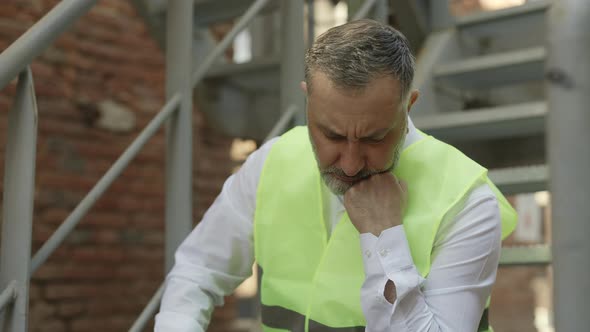 Frustrated Construction Manager Feeling Tired Outdoors, Stock Footage