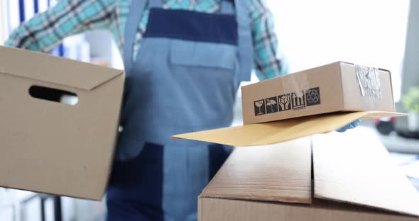 Courier Delivery Man Hands Over Boxes with Parcels, Stock Footage ...