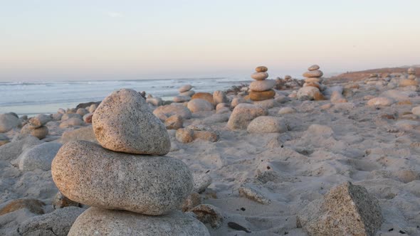 Rock Balancing on Pebble Beach, Stock Footage | VideoHive