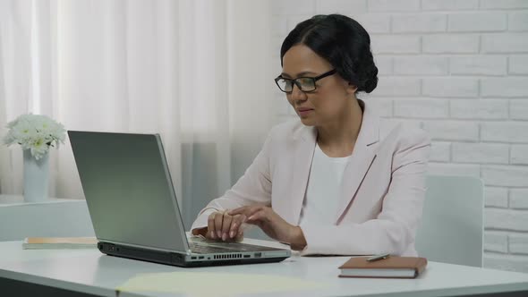 Middle Aged Lady Boss Working On Laptop Successful And Confident