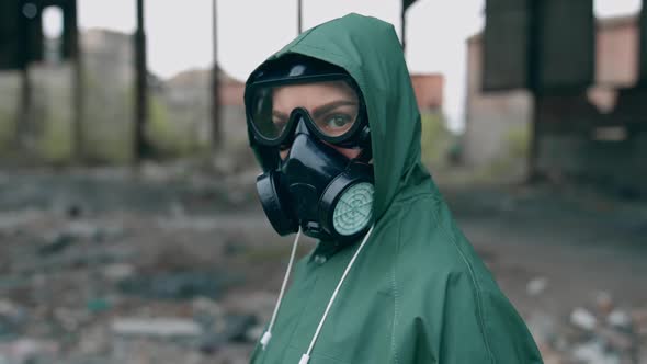 Human in gas mask near abandoned building by megafilm | VideoHive