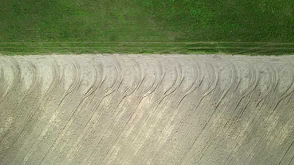 Pattern of Tread Marks From Tractor Wheels on Farmland, Stock Footage
