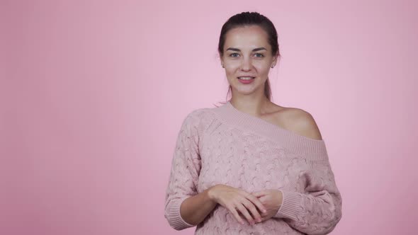 Pretty Young Talkative Woman in a Fashionable Sweater Is Talking, Stock ...