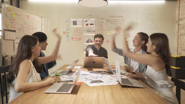 business team employee have a meeting, having fun, throwing sticky ...