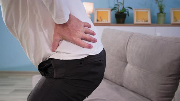 Closeup Old Man Feeling Lower Back Pain Getting Up From Couch Grandpa ...