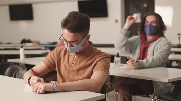 Student Throwing Paper Ball at Classmate, Stock Footage | VideoHive
