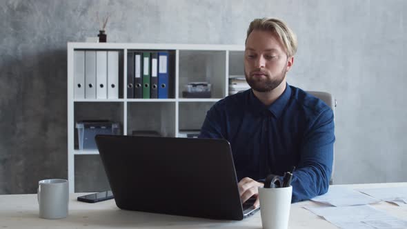 Business persons is work alone in modern office using computer ...