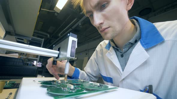 One Worker Welds Chip, Microcircuit, Microchip, Integrated Circuit ...