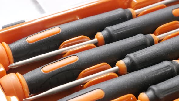 Set of small screwdrivers in the box close-up 4K 2160p 30fps UltraHD ...