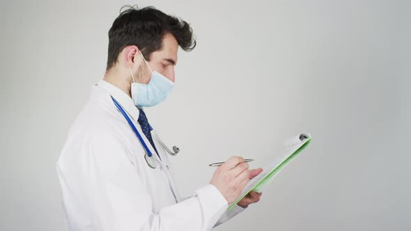 Doctor signing a paper, Stock Footage | VideoHive