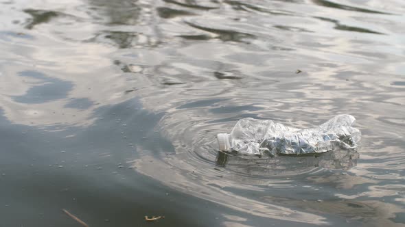 Plastic Bottle Floating in the River, Stock Footage | VideoHive
