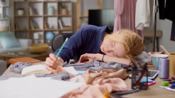Young Woman Designer Tired While Working on a New Dress, Stock Footage