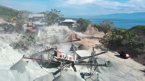 Aerial view of Extracting and transportation of rocks in a shale quarry ...