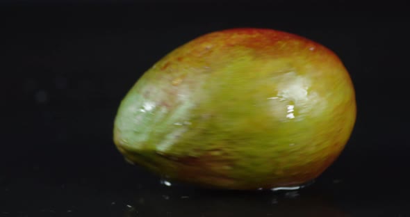 Fresh Mango Is Spinning on the Table, Stock Footage | VideoHive