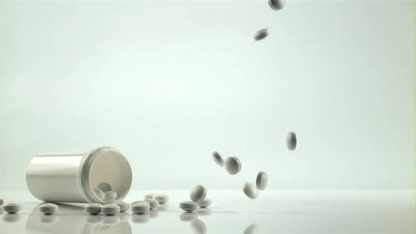 Tablets Fall on the Table, Stock Footage | VideoHive