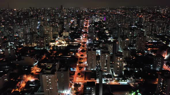 Night city landscape at downtown district. Buildings and traffic ...