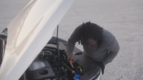 African American Black Man Trying to Repair Broken Car Engine on the ...