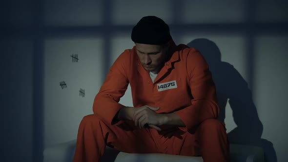 Unhappy Caucasian Male Prisoner Feeling Guilty About Crime, Thinking in ...
