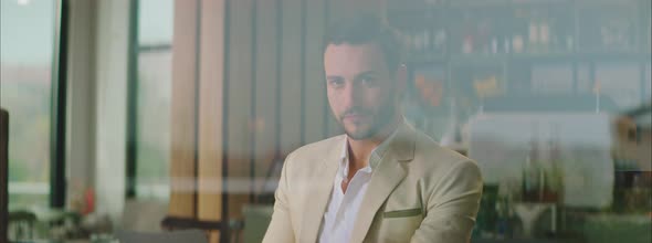 Caucasian man looking intently to camera, Stock Footage | VideoHive