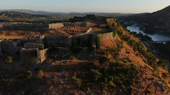 cinematic drone shot at sunset and in orbit of Rozafa's Shkoder Castle ...