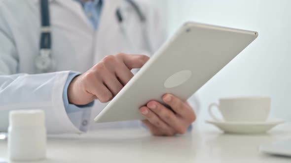 Doctor Browsing on Tablet, Stock Footage | VideoHive