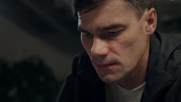 Thoughtful man doing something diligently, Stock Footage | VideoHive