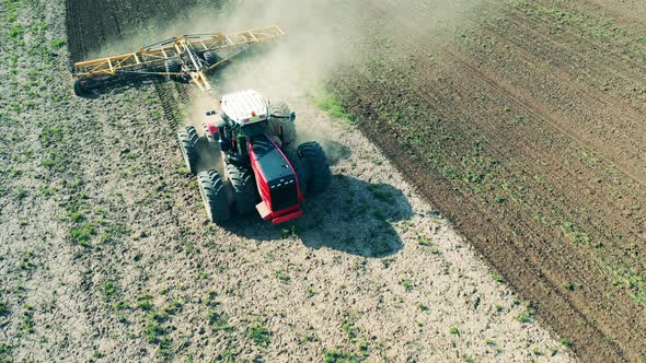 Plowing Tractor Works on a Big Field., Stock Footage | VideoHive