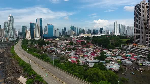 Aerial drone footage of Panama City contrast between poor area and rich ...