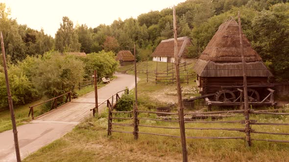 Old Village Landscape with Small Wooden Bridge and Hedges, Stock Footage