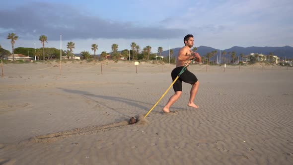 sportsman doing energetic drag exercise with running, Stock Footage
