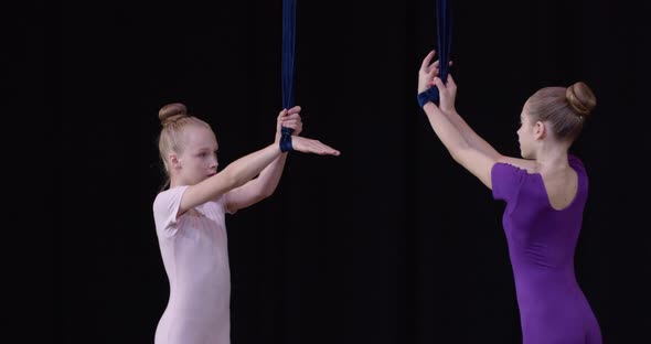 Aerial Gymnasts are Posing and Smiling While Holding the Strings, Stock ...