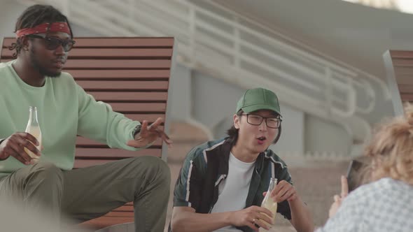 Three Diverse Gen Z Friends Hanging Out Outdoors, Stock Footage | VideoHive