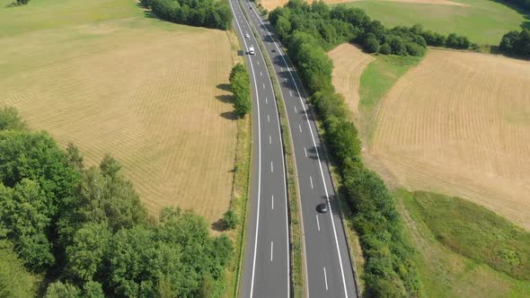 german autobahn from above through landscape, Stock Footage | VideoHive