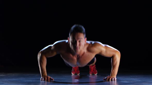 Asian Athlete Push Ups, Squeezes From the Floor, He Is Strong and Hardy ...