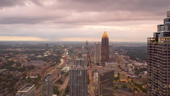 Drone time lapse at sunset headed north over the Atlanta connector ...