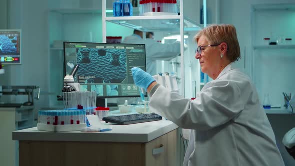 Medical Research Scientist Typing Genetic Codes on Pc, Stock Footage