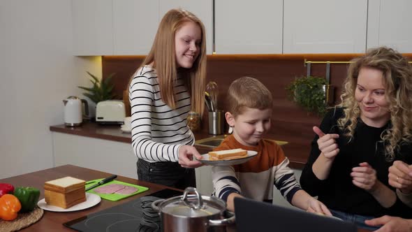Happy Mute Parents Taking Food Prepared By Kids, Stock Footage | VideoHive